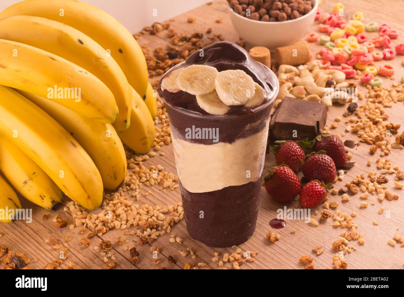 Traditional Brazilian Acai with topping, banana, oats and strawberry ...