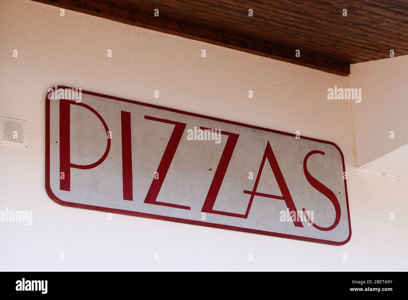 pizzeria pizzas sign words painted on a restaurant shop wall of italian ...