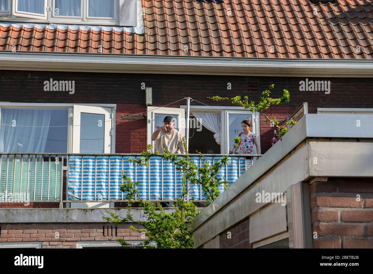 Angry Man Shouting Against His Neighbor On The Other Side At Amsterdam ...
