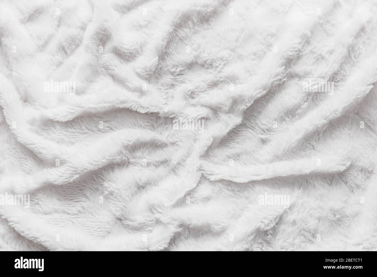 Abstract horizontal white texture wool background. Wrinkled lamb fur ...