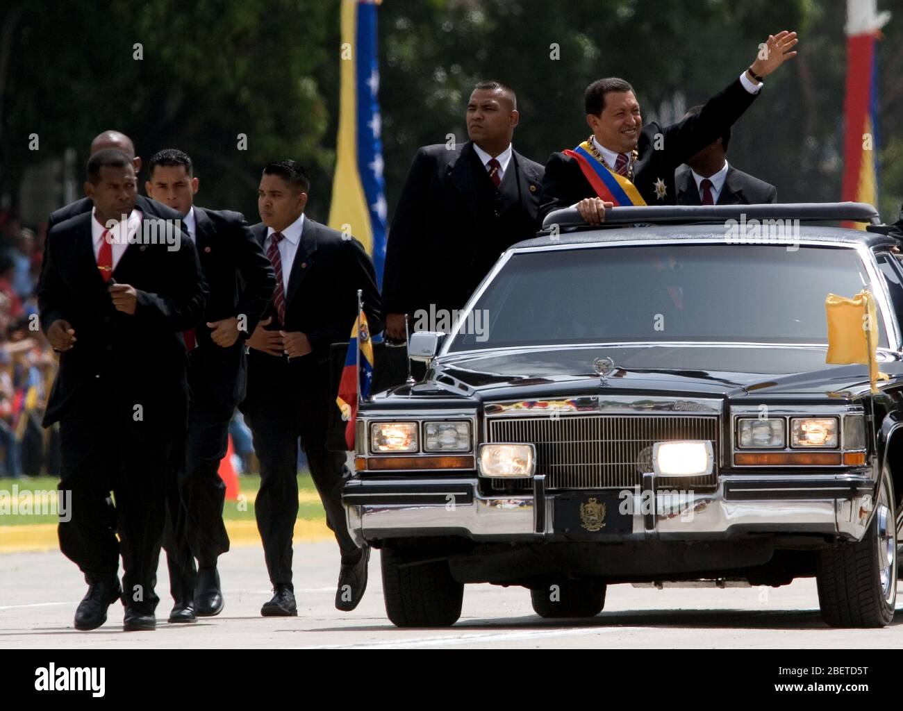 Venezuelan President Hugo Chavez arrives to a military parade in ...