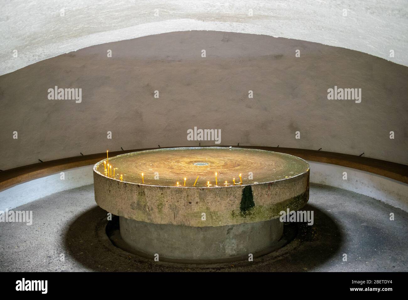 Round table with lighted candles in the memory of the victims from the ...