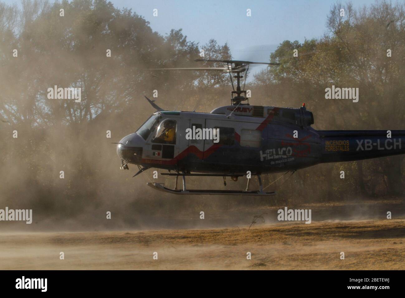 Helicopter used by the Conafor, National Forestry Commission to fight ...