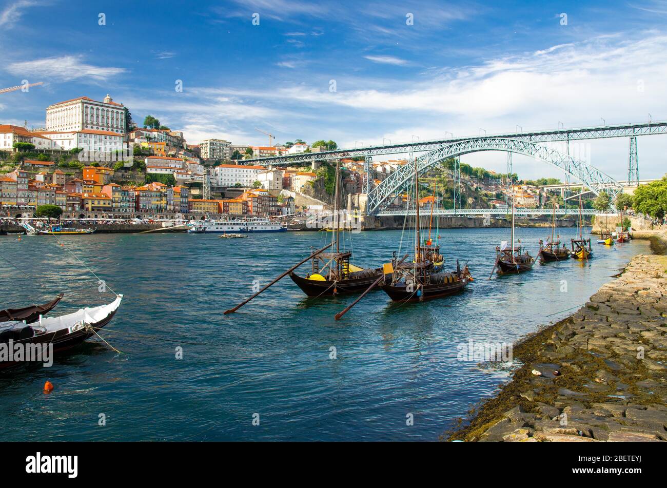 Portugal, city landscape Porto, wooden boats with wine port barrels on ...