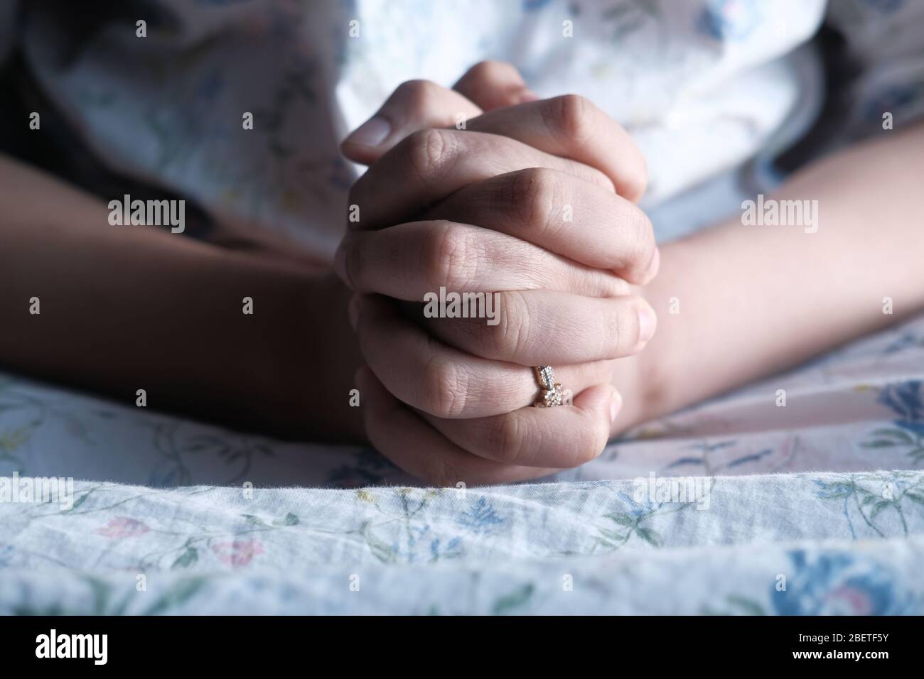 One hand over the other hi-res stock photography and images - Alamy