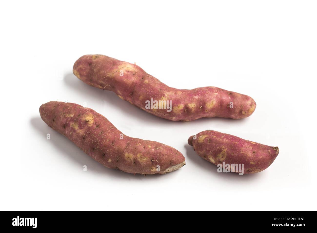 Sweet Potato Root isolated on white background Stock Photo - Alamy