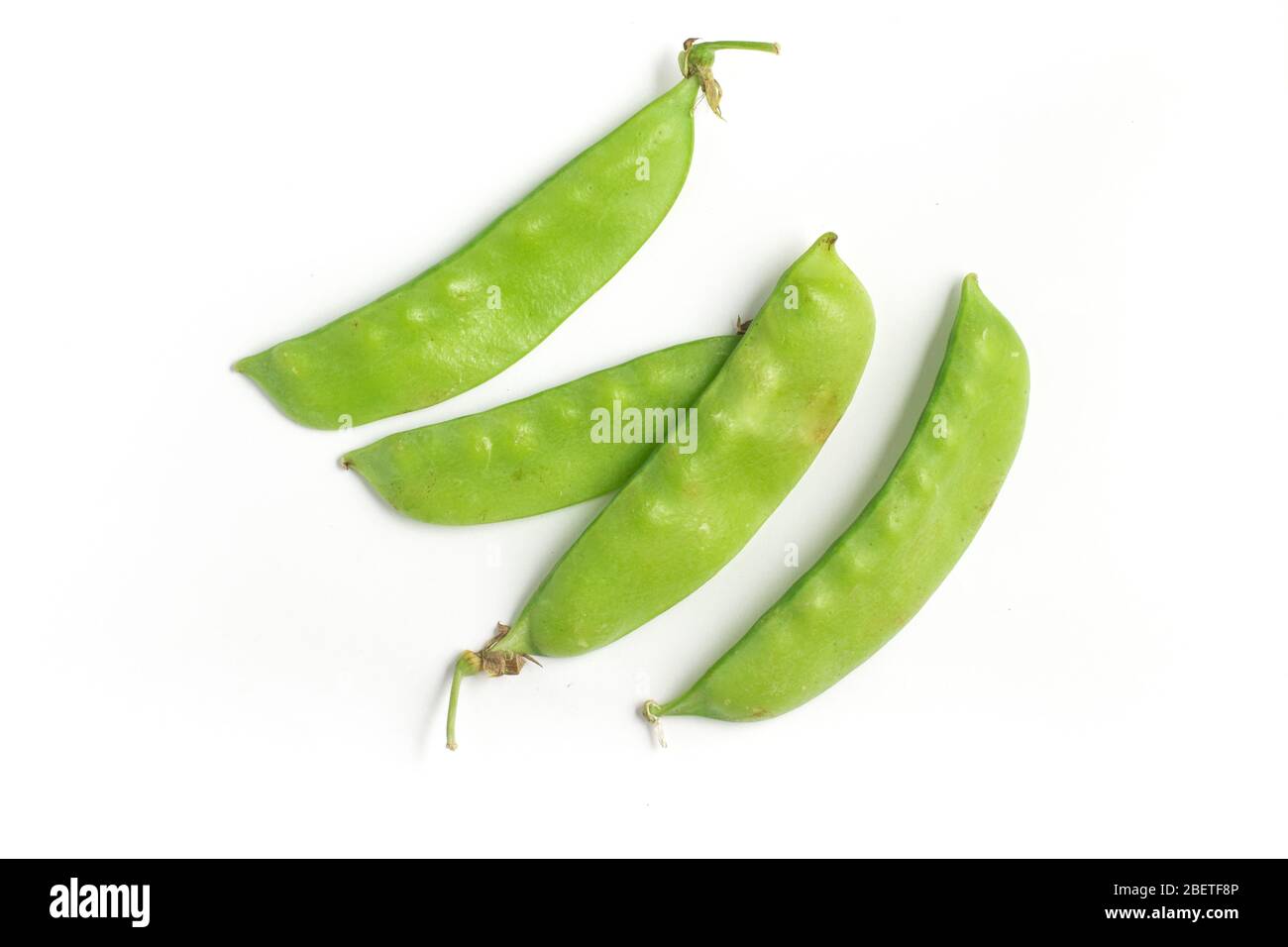 Organic Pea Pods isolated on white background Stock Photo - Alamy