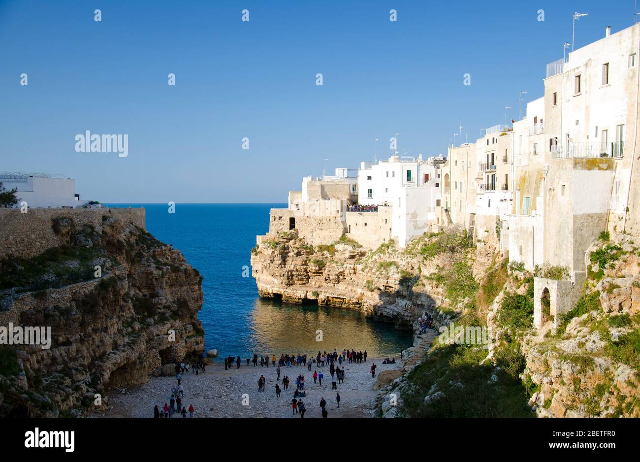 View of the beach lama monachile cala porto and white buildings on ...