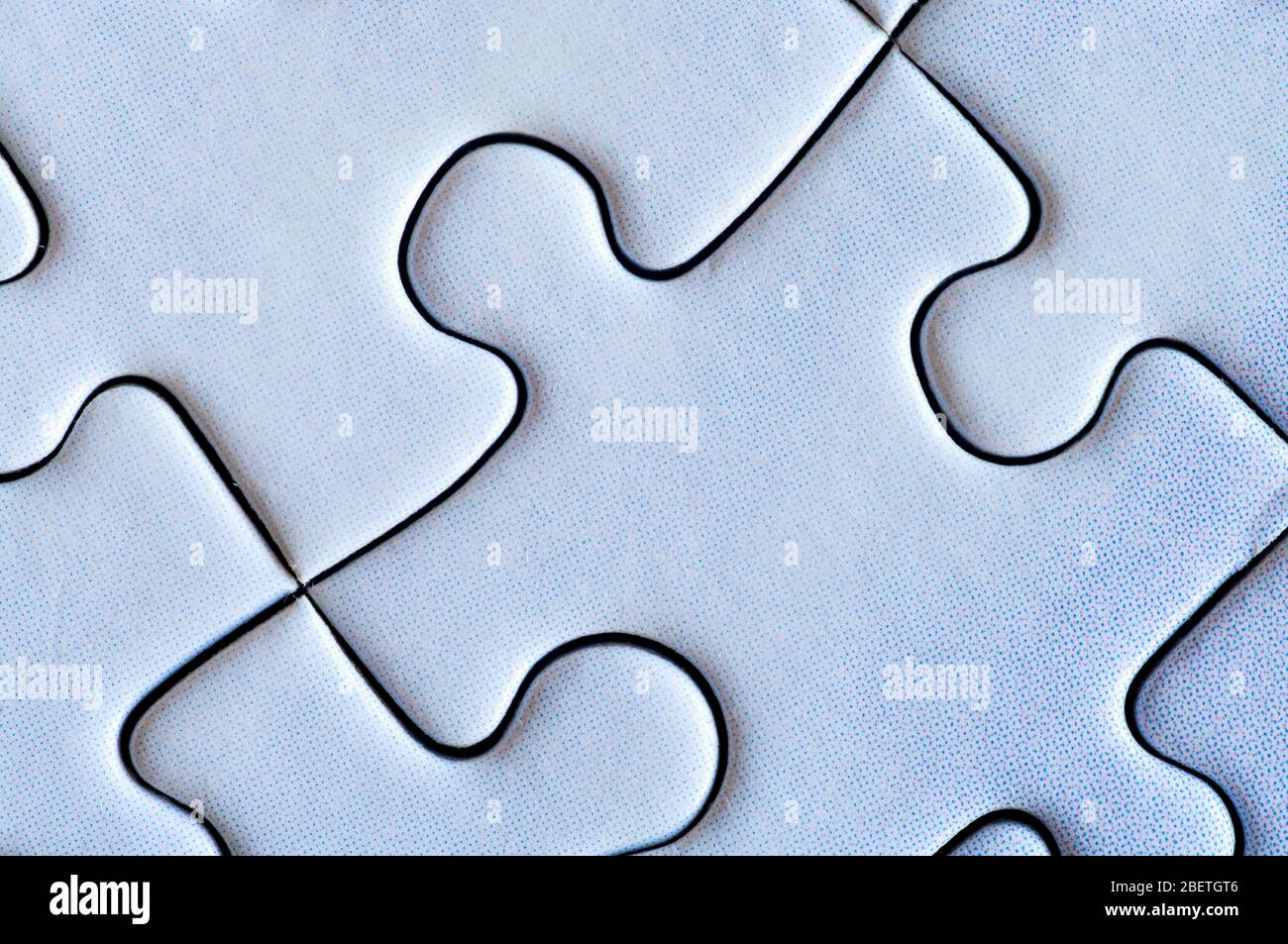 Jigsaw puzzle pieces connected together hi-res stock photography and ...