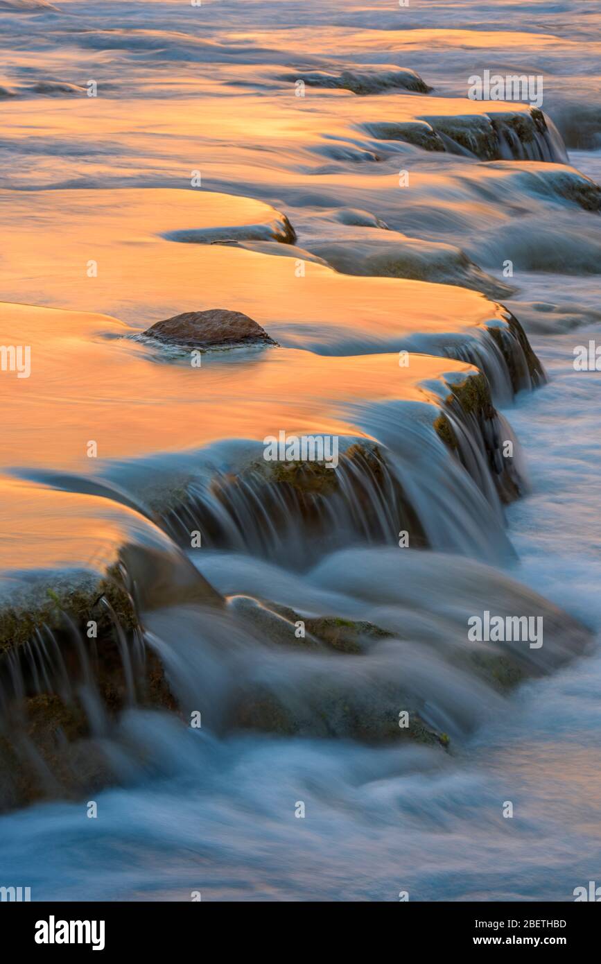 Little Colorado River- mineral-laden water flowing over travertine ...