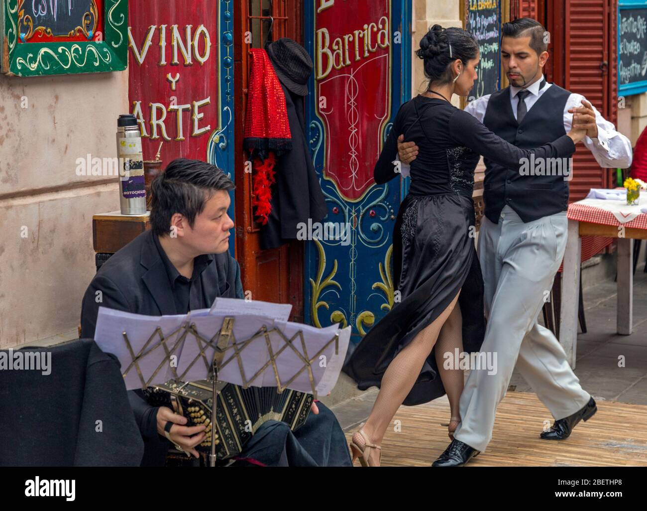 Professional tango dancers performing at La Boca. Buenos Aires ...