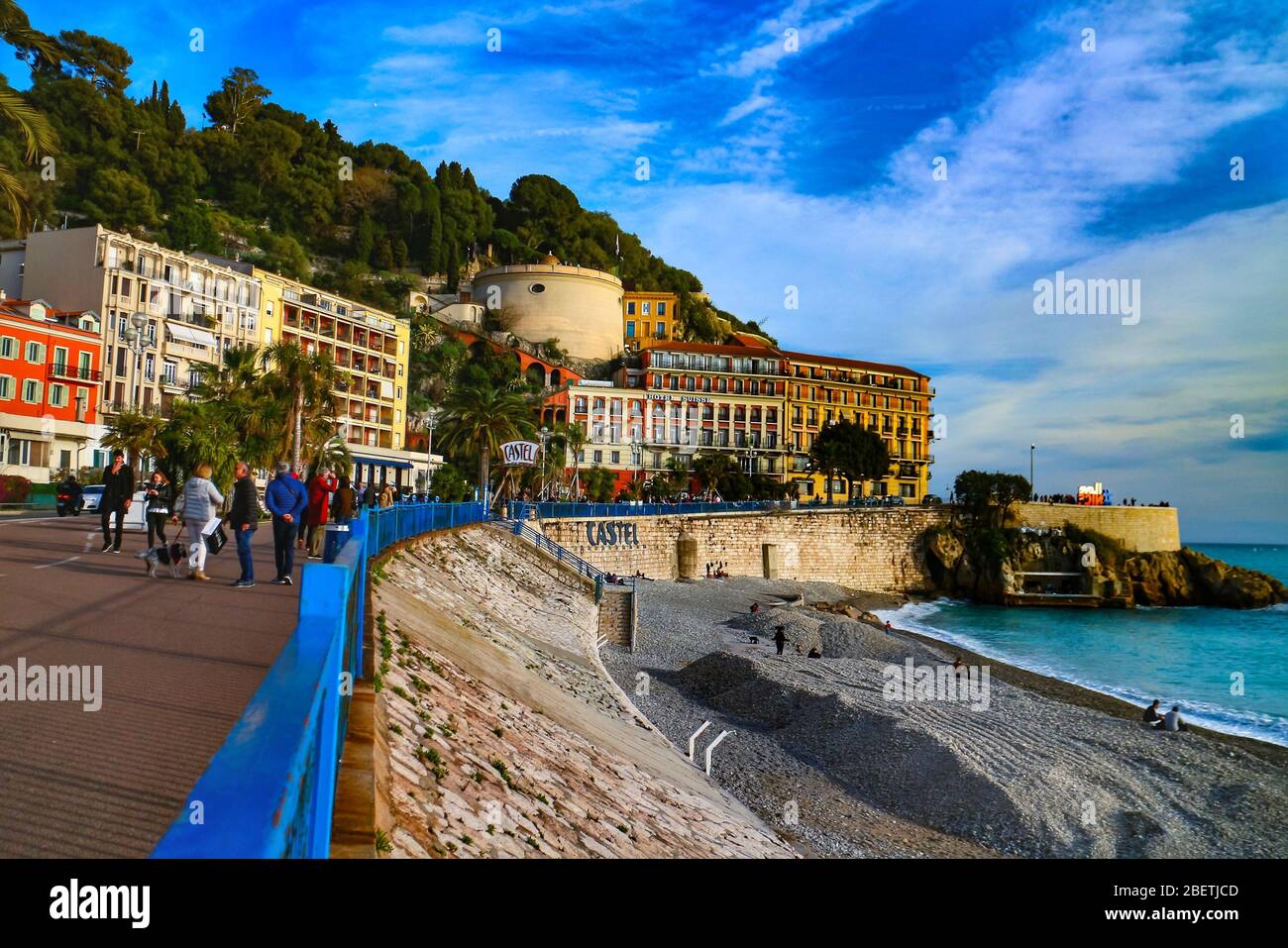 Nice, France waterfront with pebble beach, Bellanda tower and castle ...