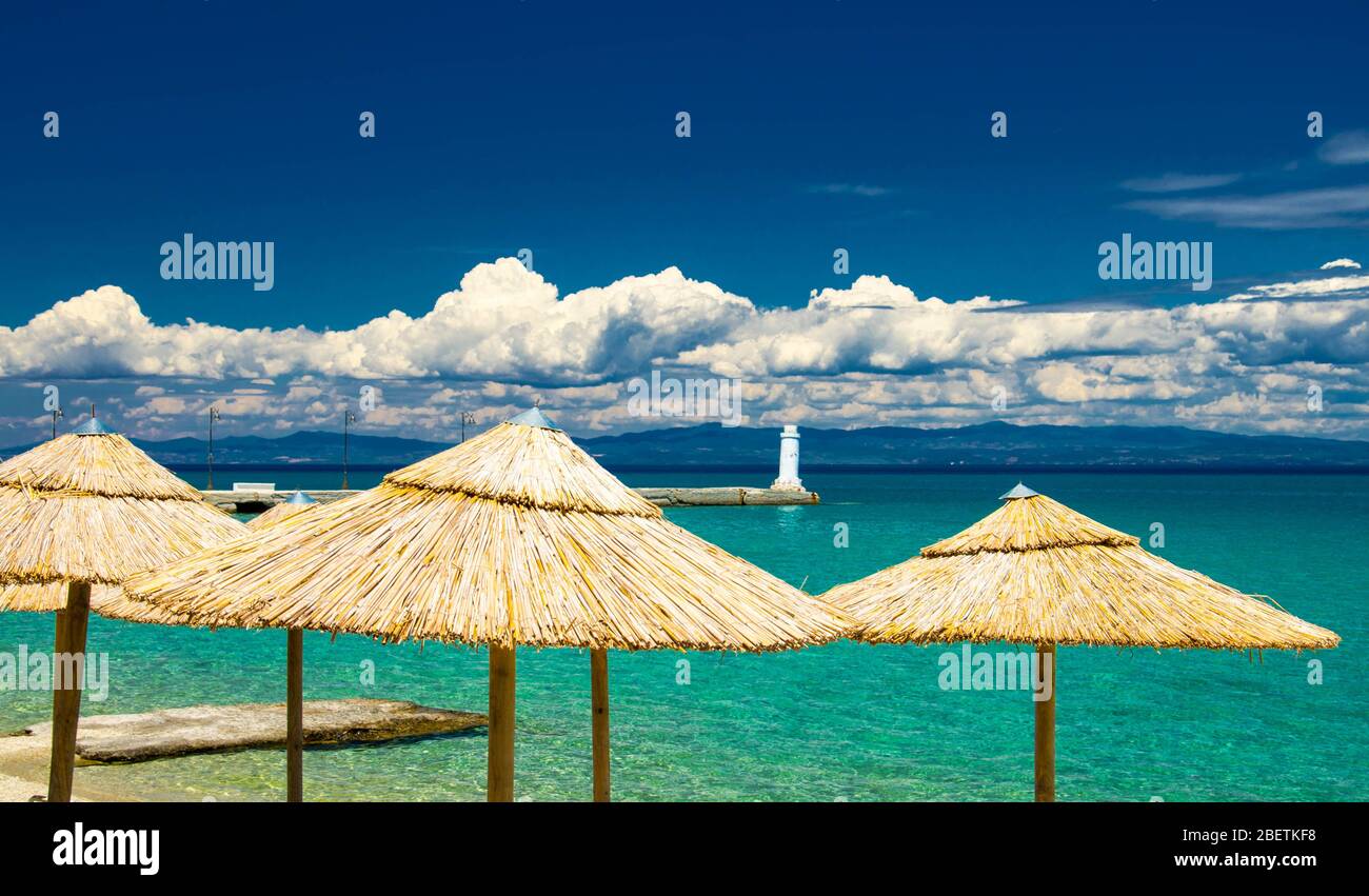 View of blue paradise water of Toroneos kolpos gulf, blue sky, white ...