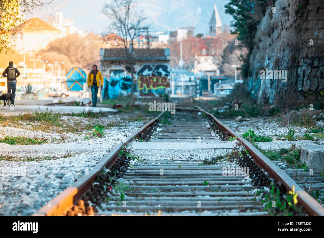 Straight trail tracks in urban downtown of split, croatia. People ...