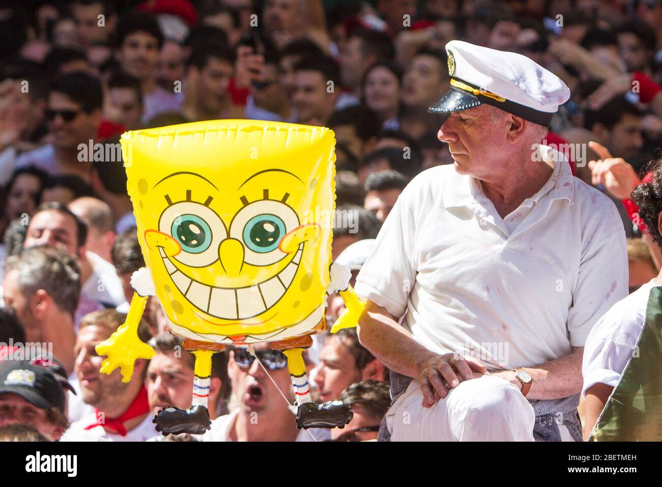 Pepople during the rocket launch of San Fermin at the hall square. July ...