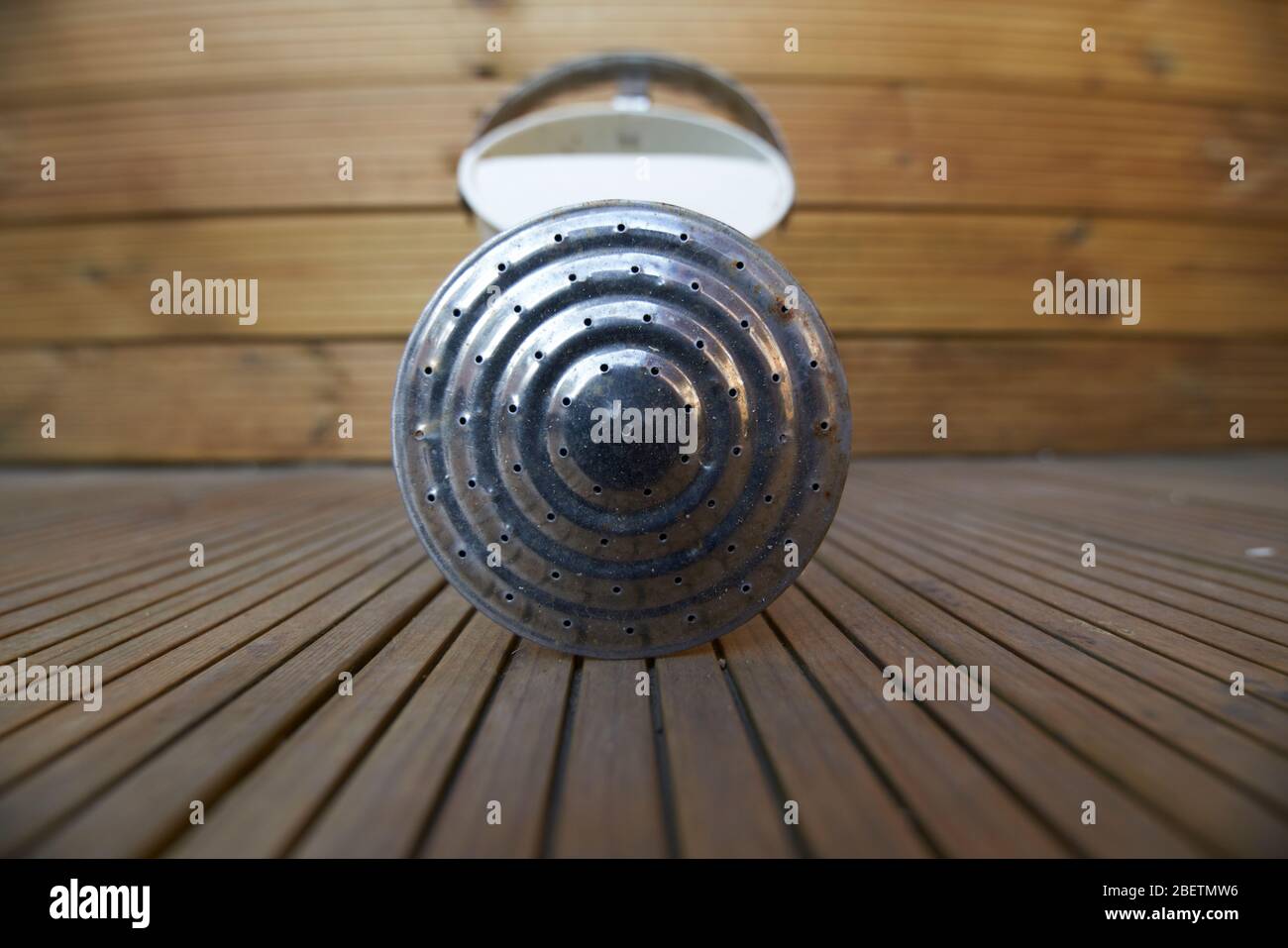 White and silver watering can Stock Photo - Alamy
