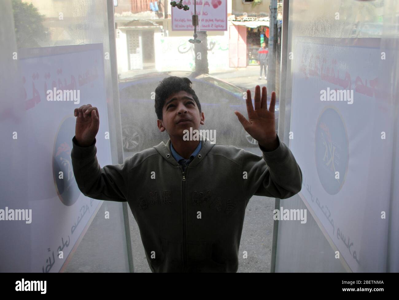 Gaza. 15th Apr, 2020. A Palestinian boy is seen inside a disinfection ...