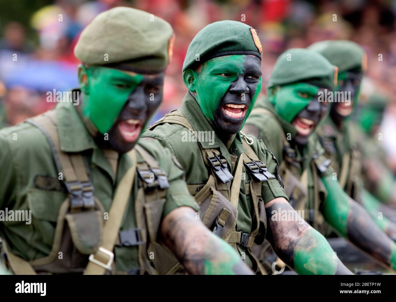 Venezuelan soldiers march during a military parade in Valencia ...