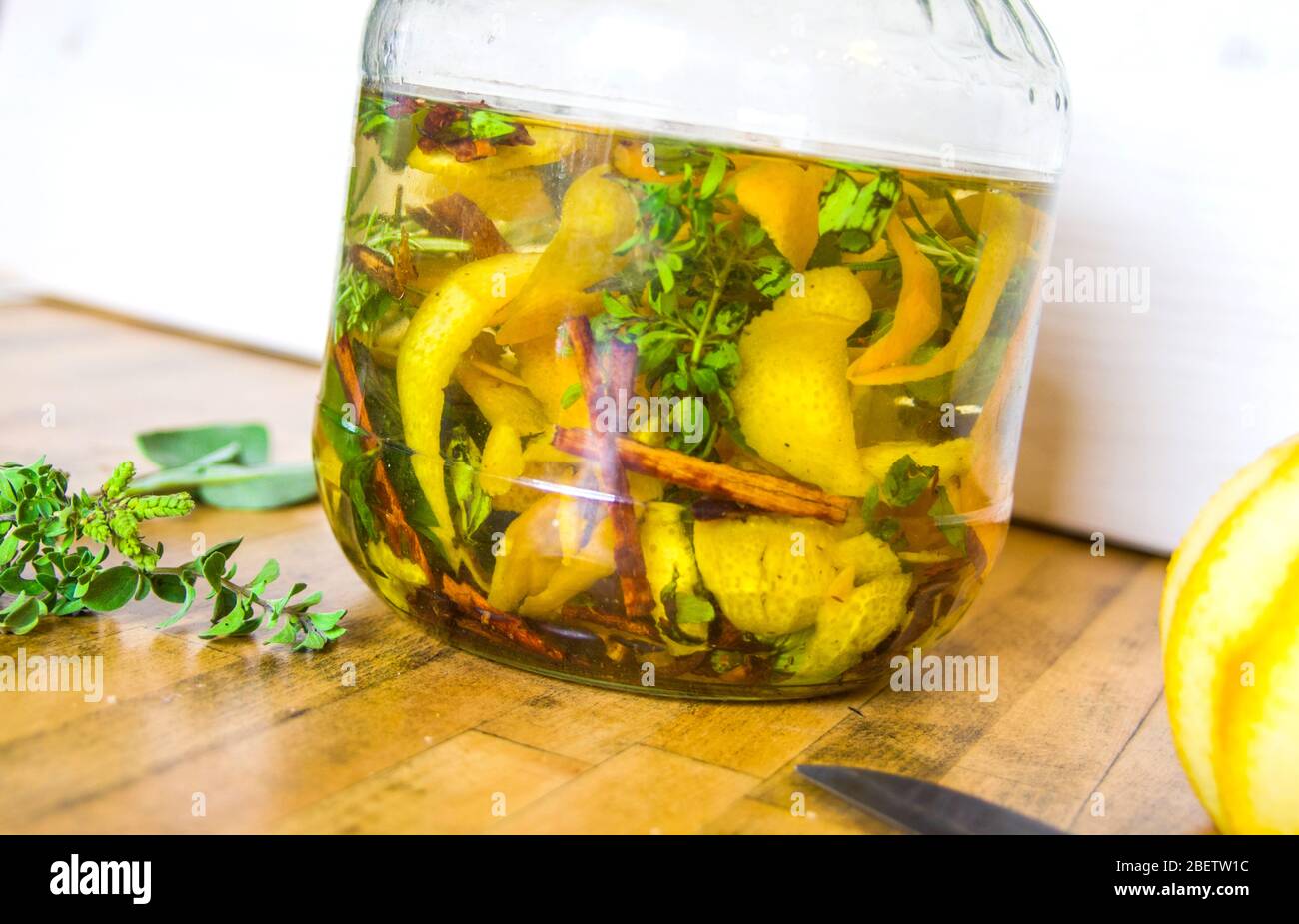 herbs infused in alcohol, craftsman produces liqueur with herbs and ...