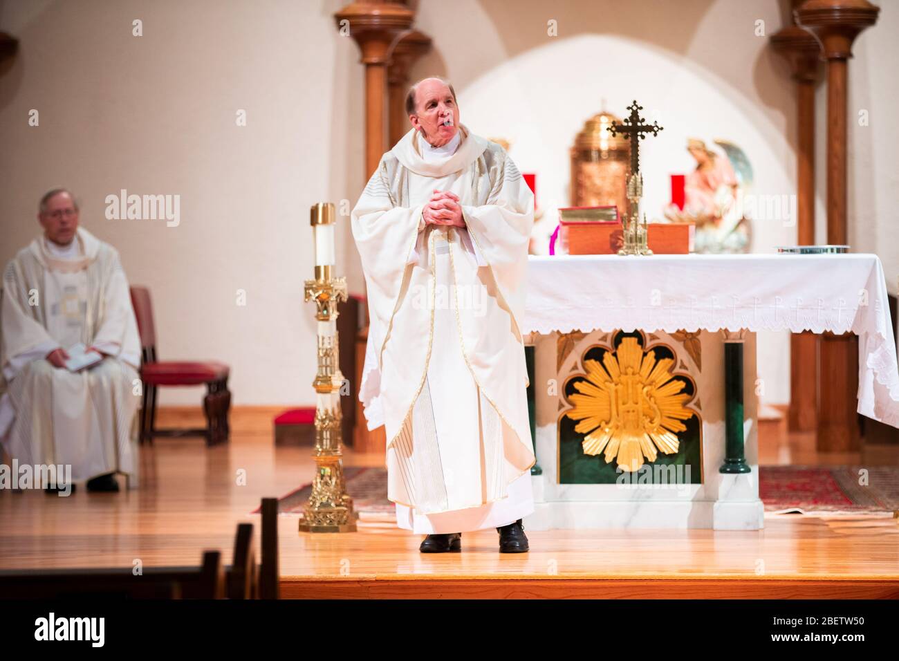An Easter service is live-streamed at Saint Patrick Catholic Church in ...