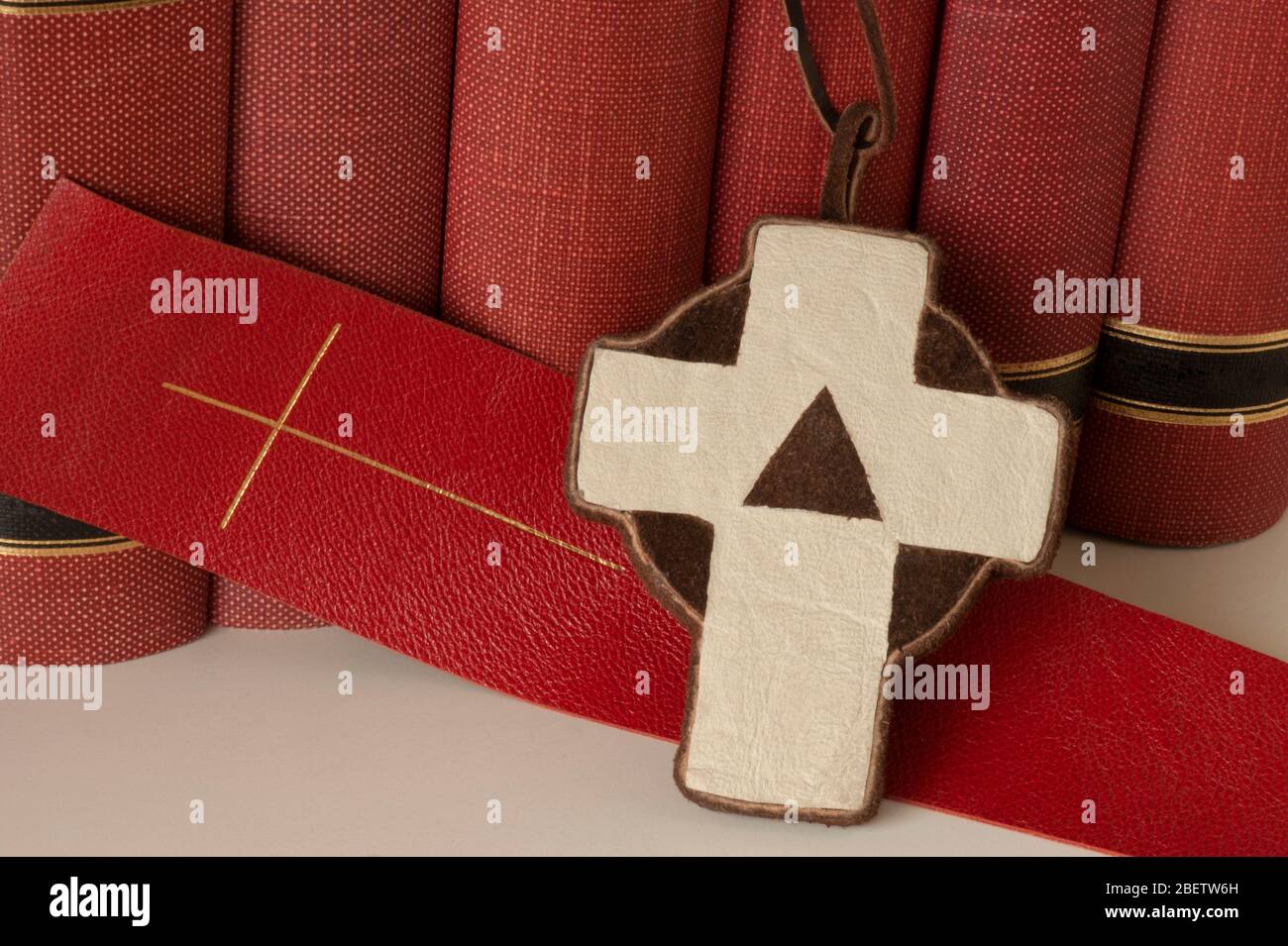 White leather cross in foreground made by this photographer with red ...