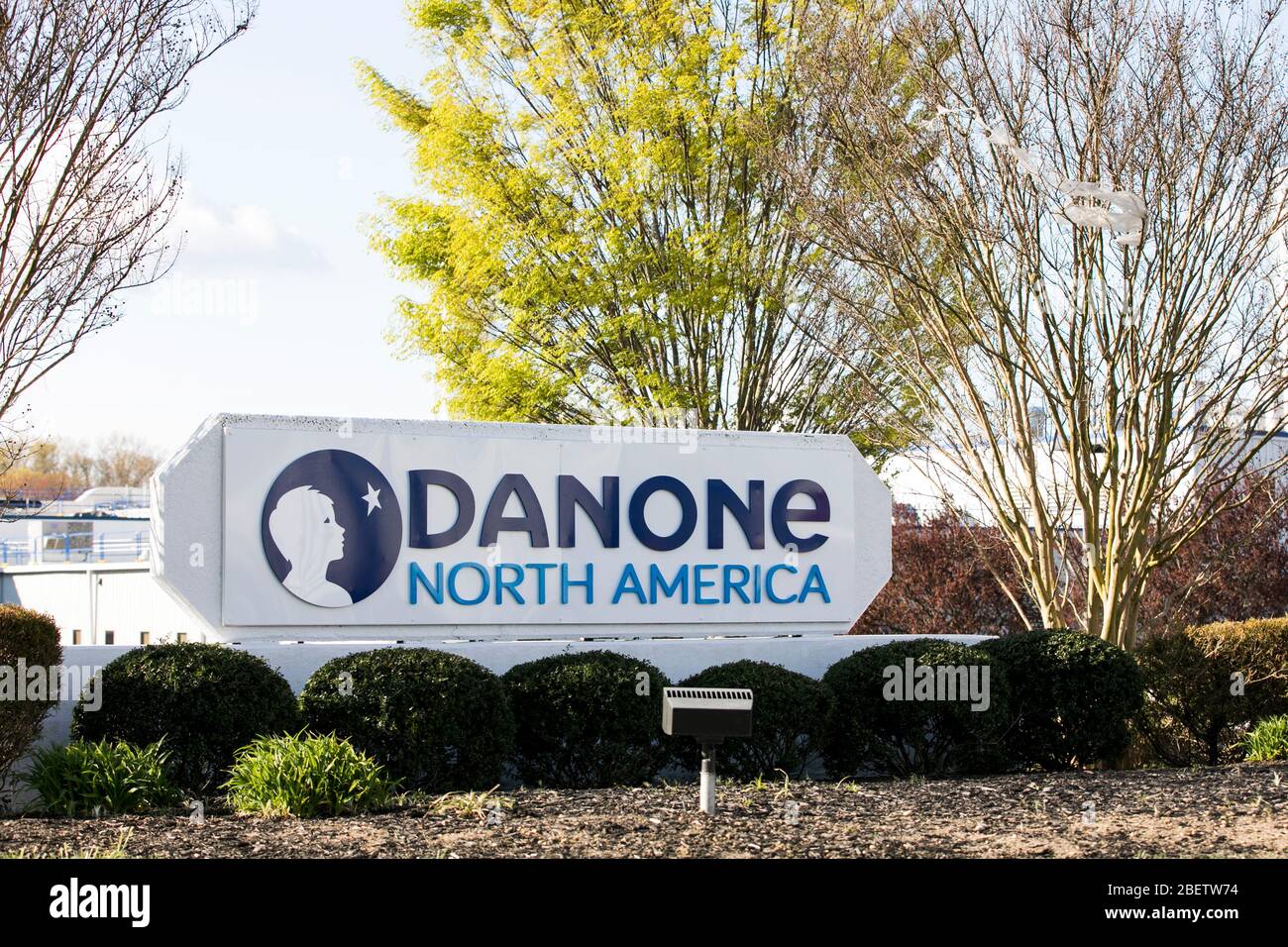 A logo sign outside of a facility occupied by Danone North America in ...