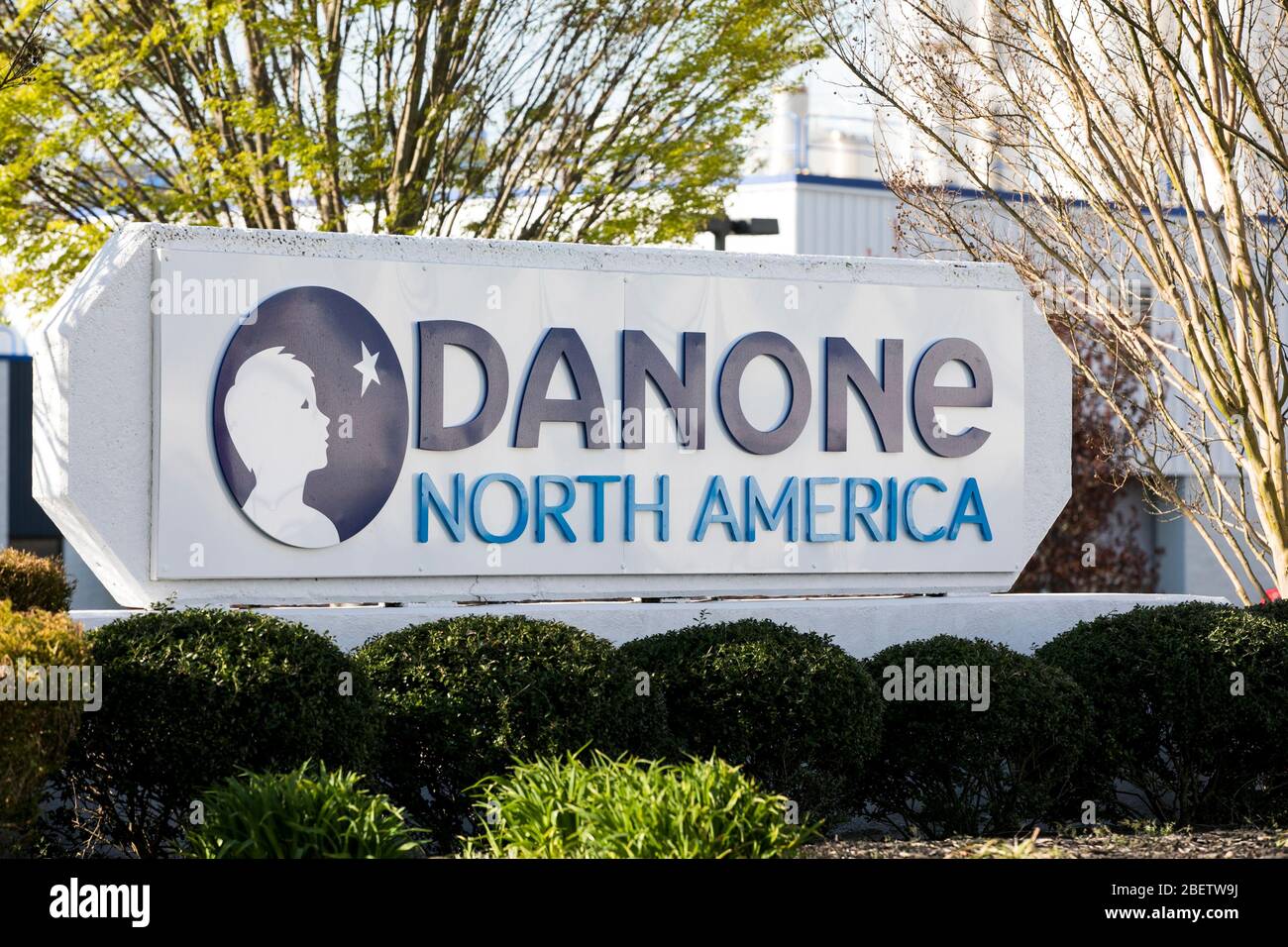 A logo sign outside of a facility occupied by Danone North America in ...