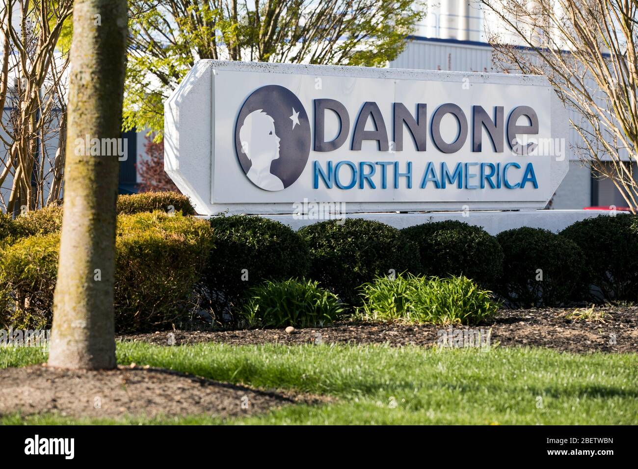 A logo sign outside of a facility occupied by Danone North America in ...