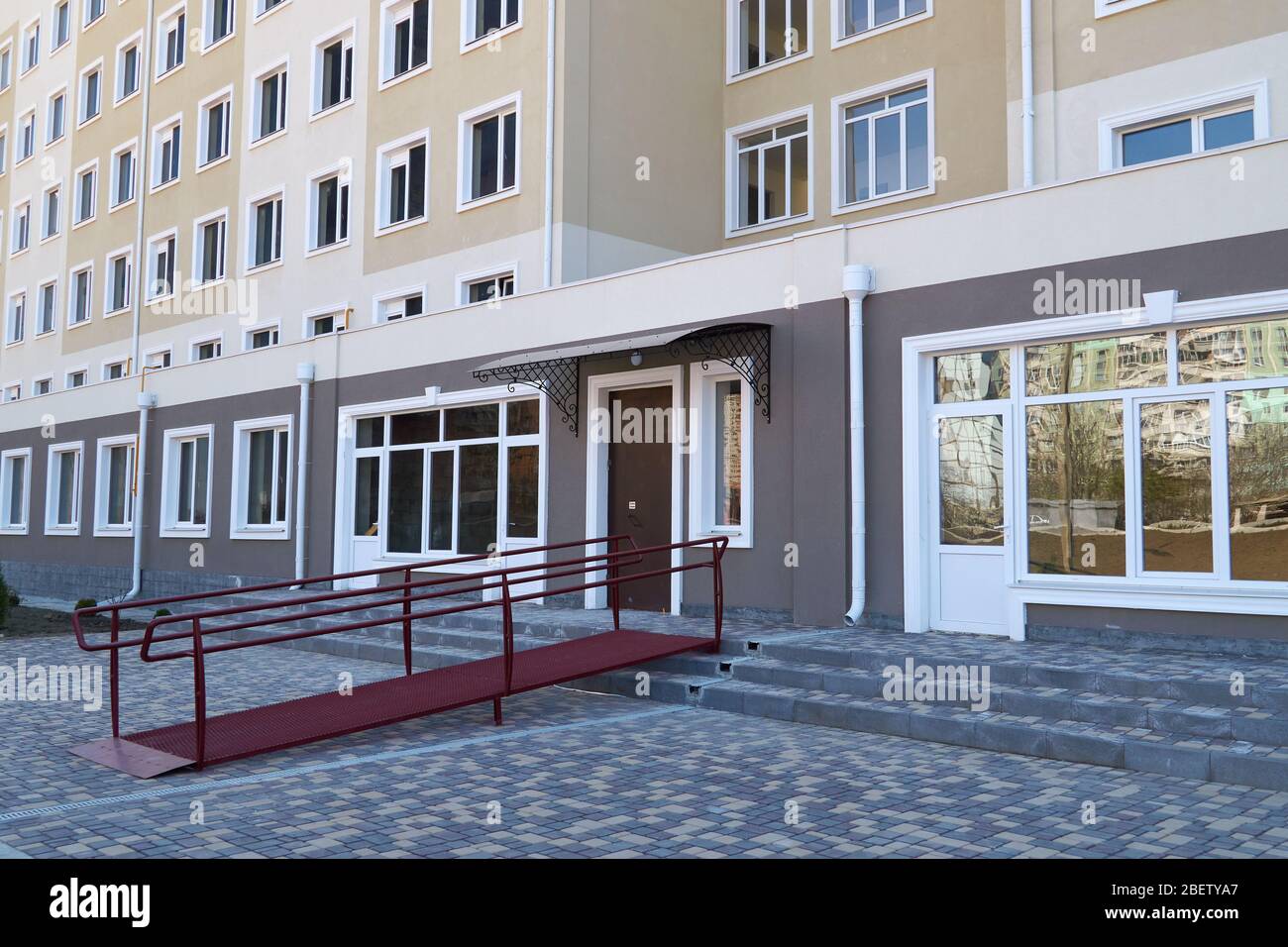 Wheelchair access ramp for entrance of residential multistory building ...