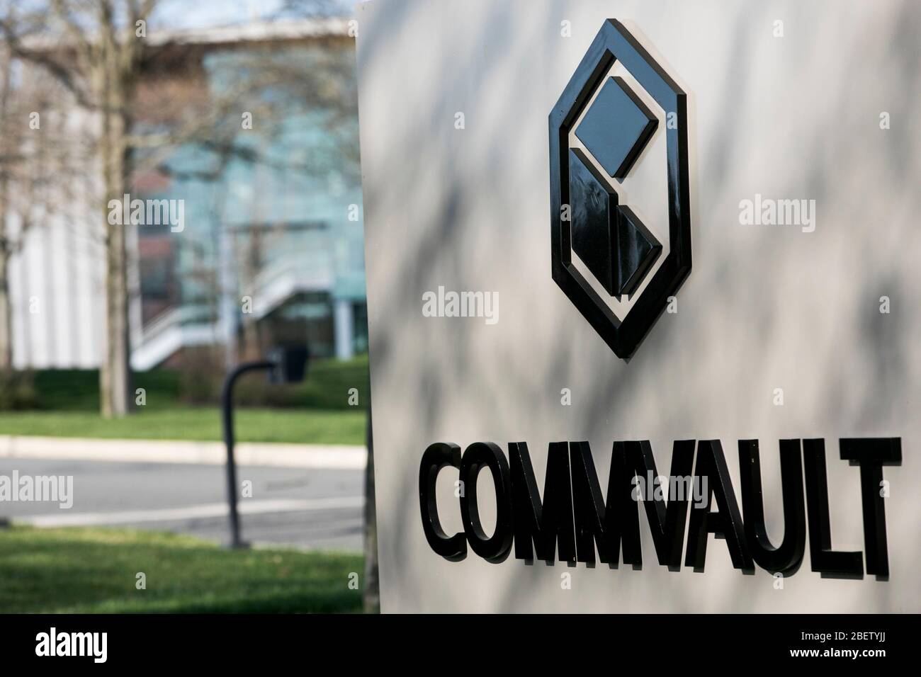 A logo sign outside of the headquarters of Commvault in Tinton Falls ...