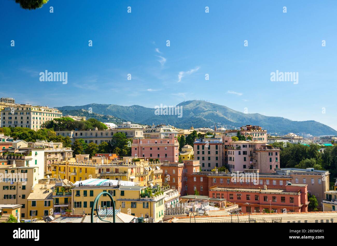 Colorful buildings on hill in city district of Genoa Genova and Monte ...