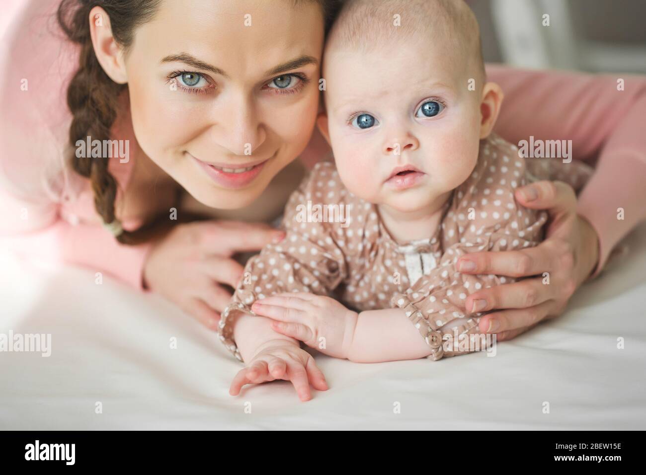 Mom with a baby Stock Photo - Alamy