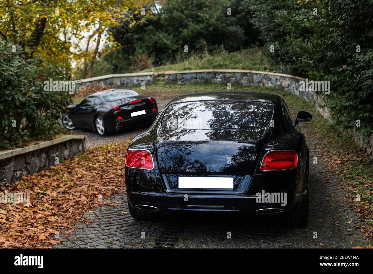 Two black cars hi-res stock photography and images - Alamy