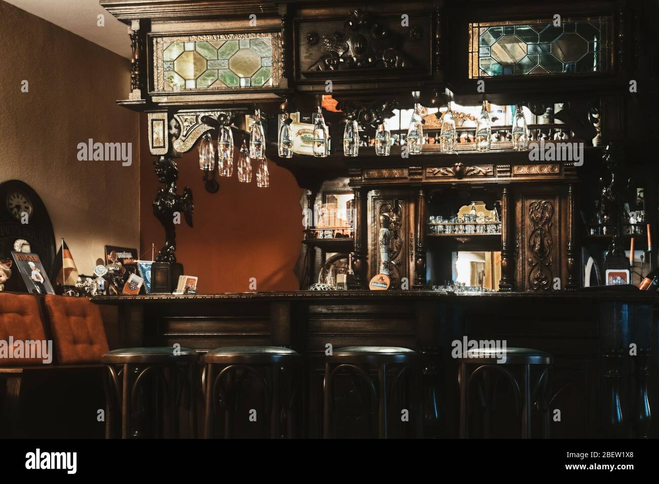 Old English bar with decorations and stools in the foreground Stock ...