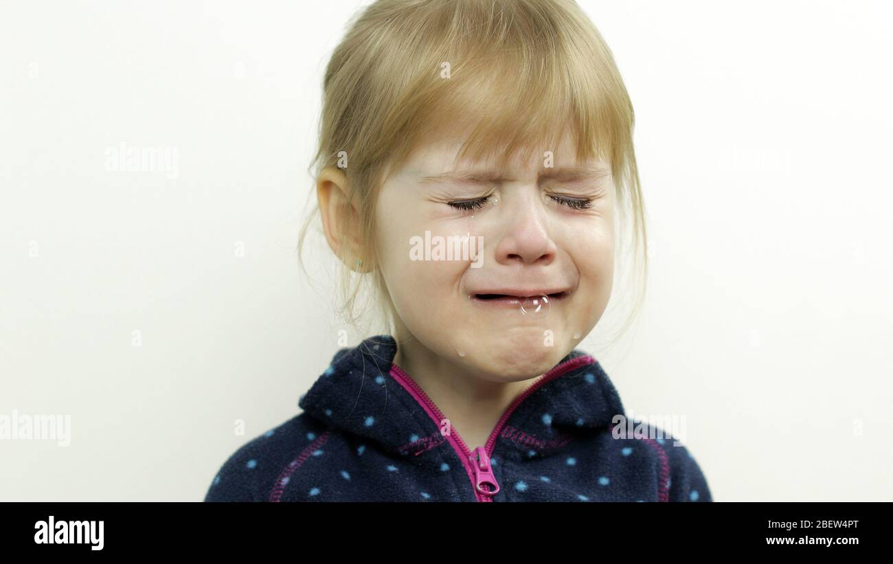 Portrait of little toddler girl crying and tears down her face ...
