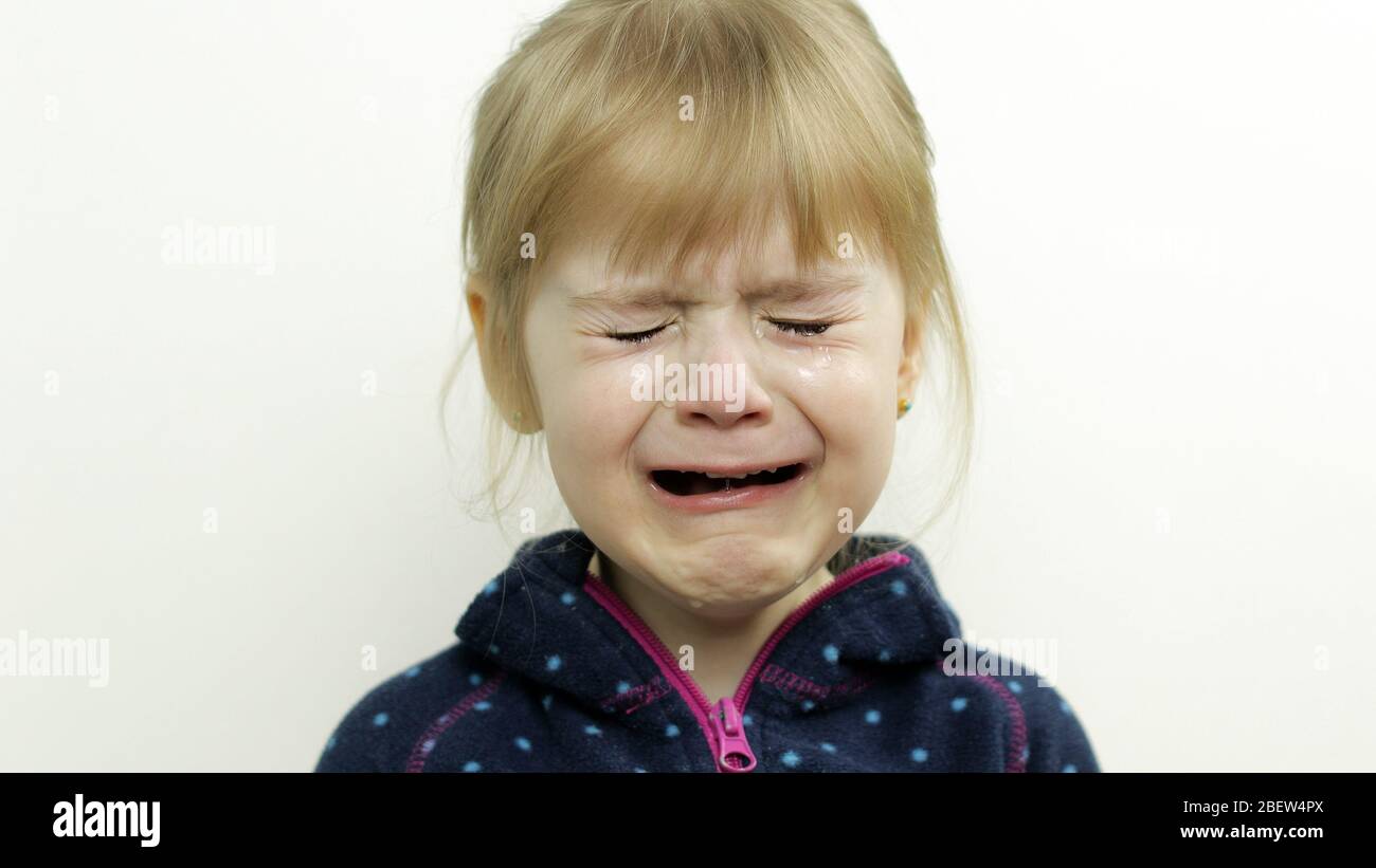 Portrait of little toddler girl crying and tears down her face ...