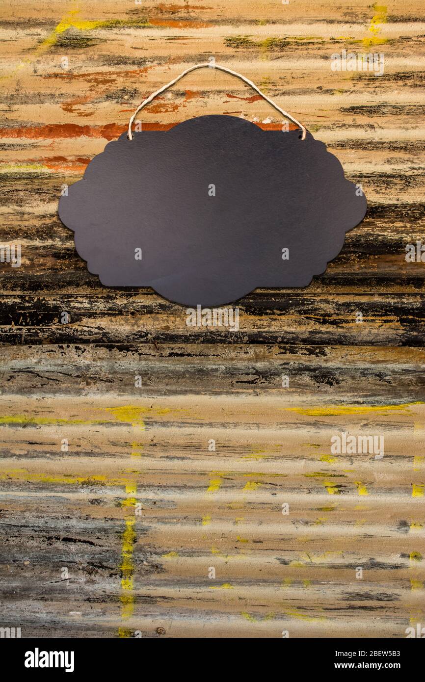Black Empty Sign Board with string for hanging on wall Stock Photo - Alamy