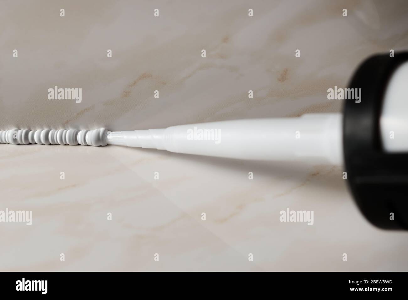 Drawing caulking a silicone joint jointing with cartridge gun for ...