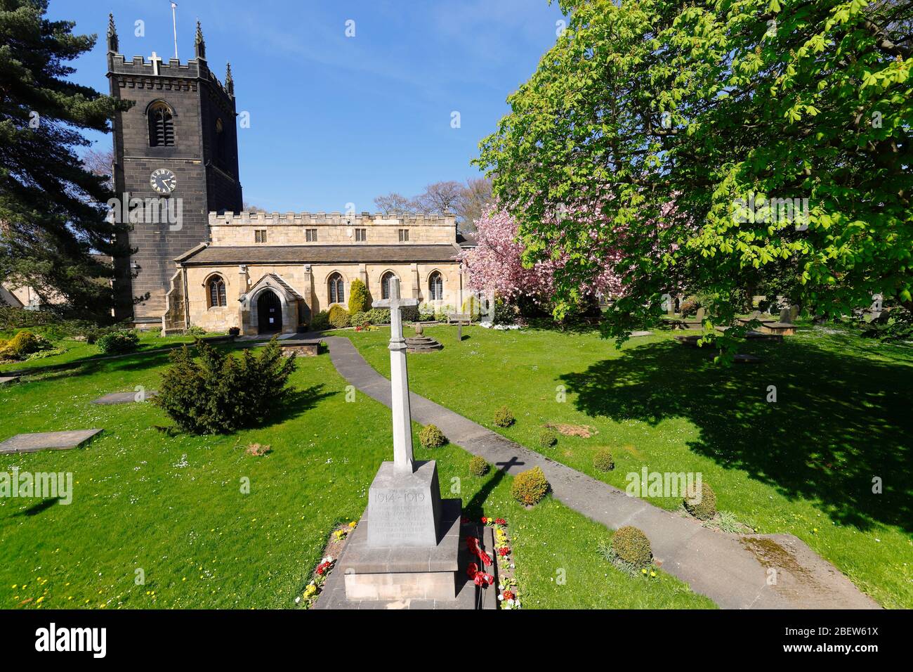 St Mary's Church in Swillington with pink blossom trees Stock Photo - Alamy