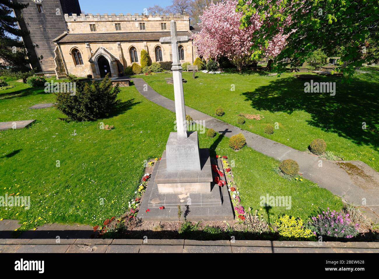 St Mary's Church in Swillington with pink blossom trees Stock Photo - Alamy