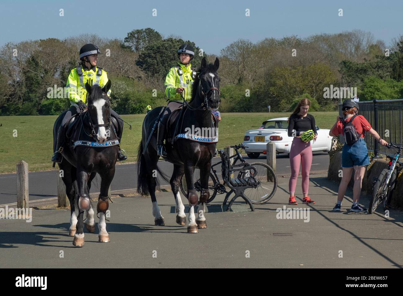 Mounted policewomen of the Avon & Somerset Constabulary, moving on ...