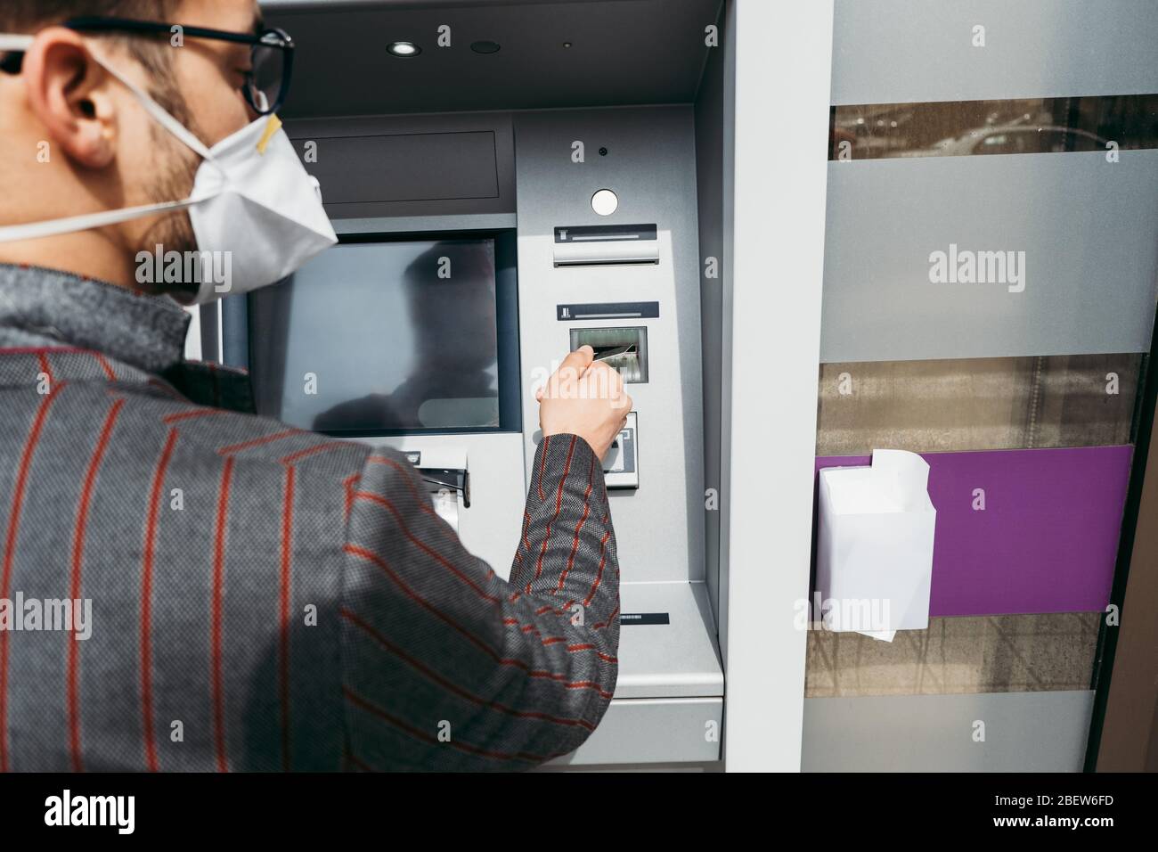 Business man with protective face mask using street ATM machine Stock ...