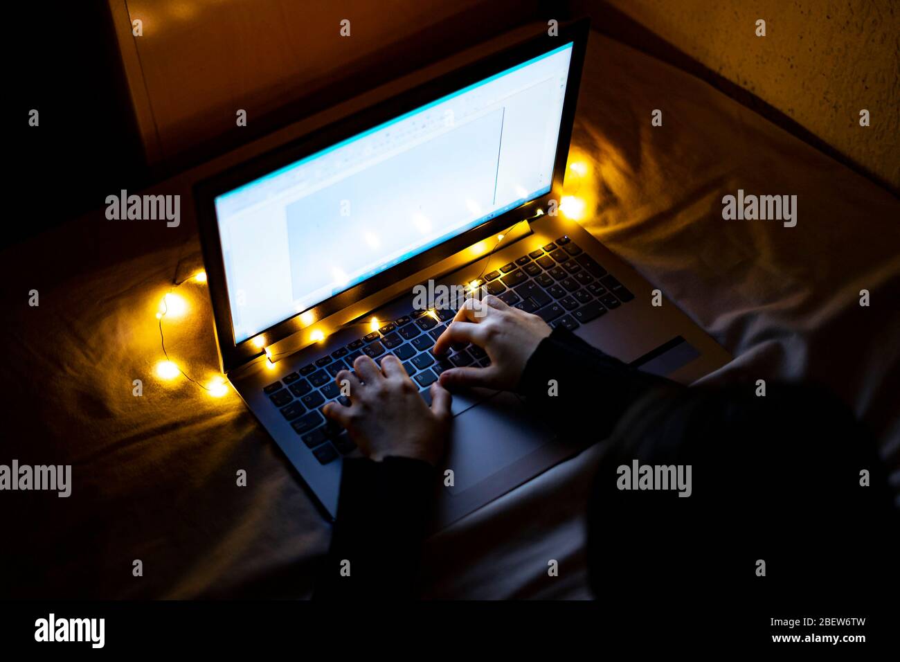 Using laptop night hi-res stock photography and images - Alamy