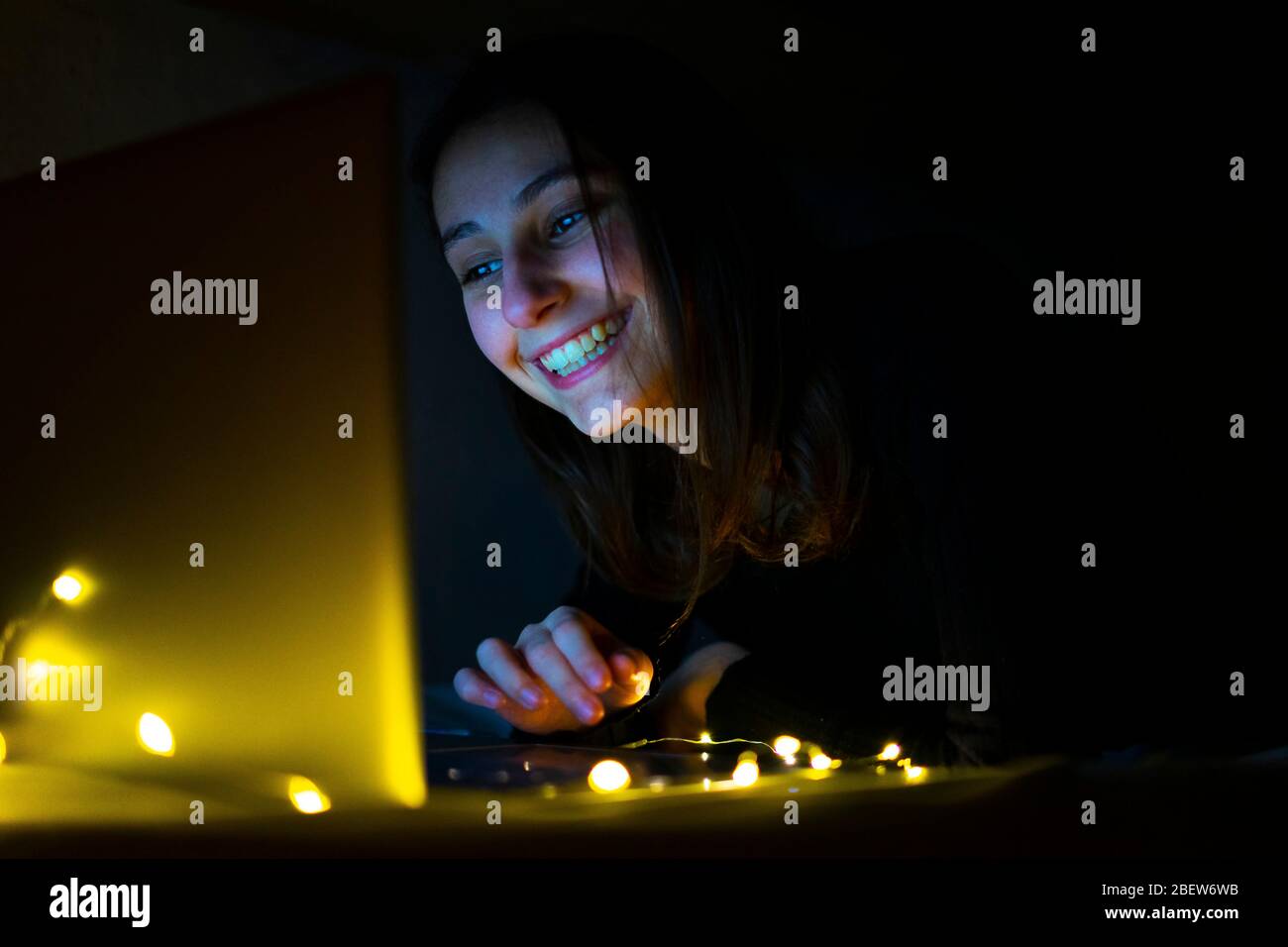 Using laptop at night hi-res stock photography and images - Alamy