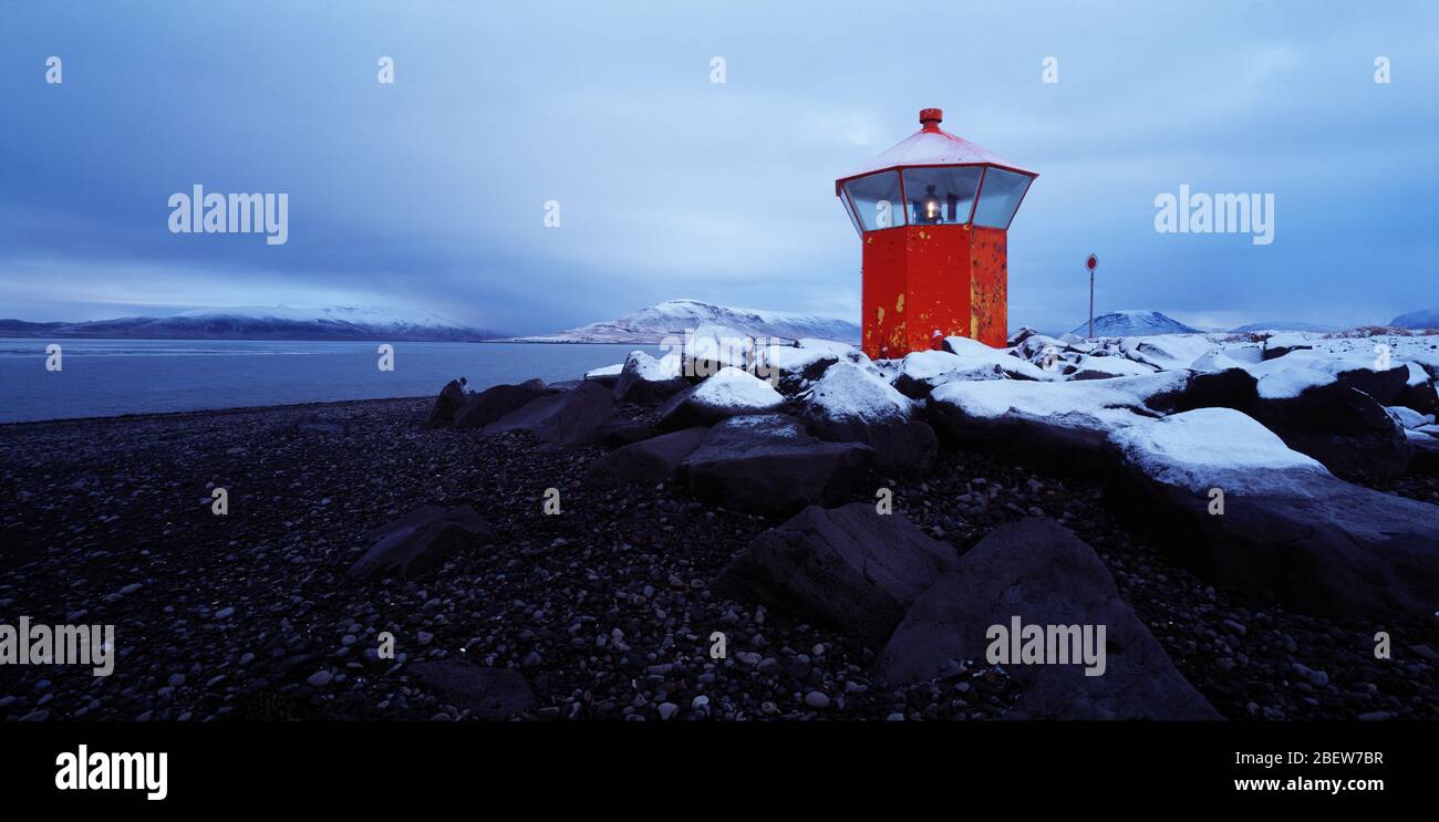 lighthouse at the fjord Hvalfjordur Stock Photo - Alamy