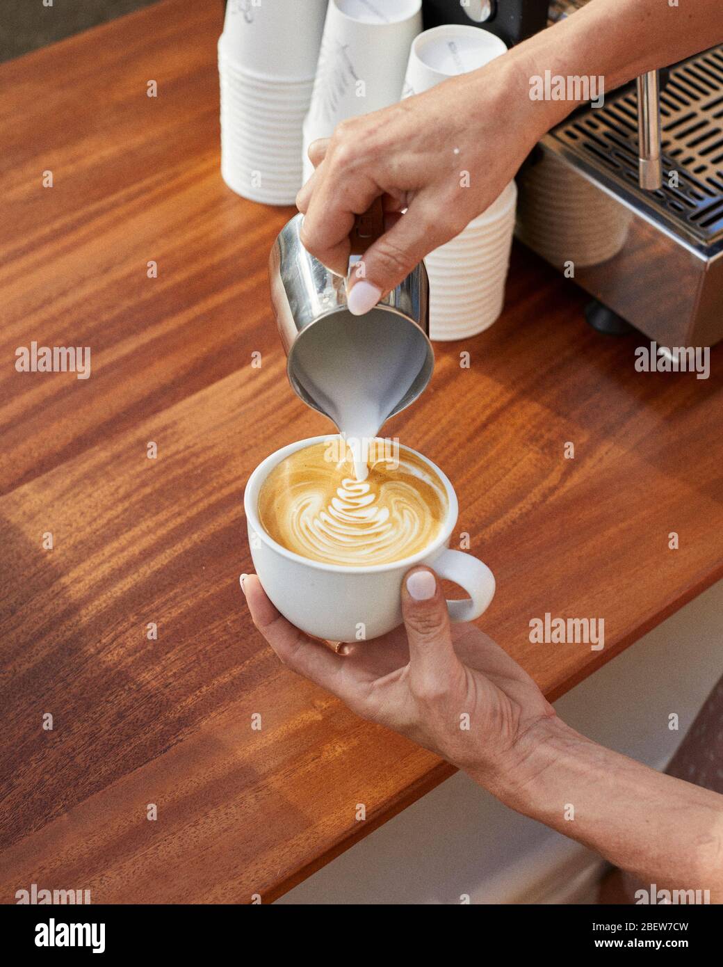 Barista making art latte hi-res stock photography and images - Alamy