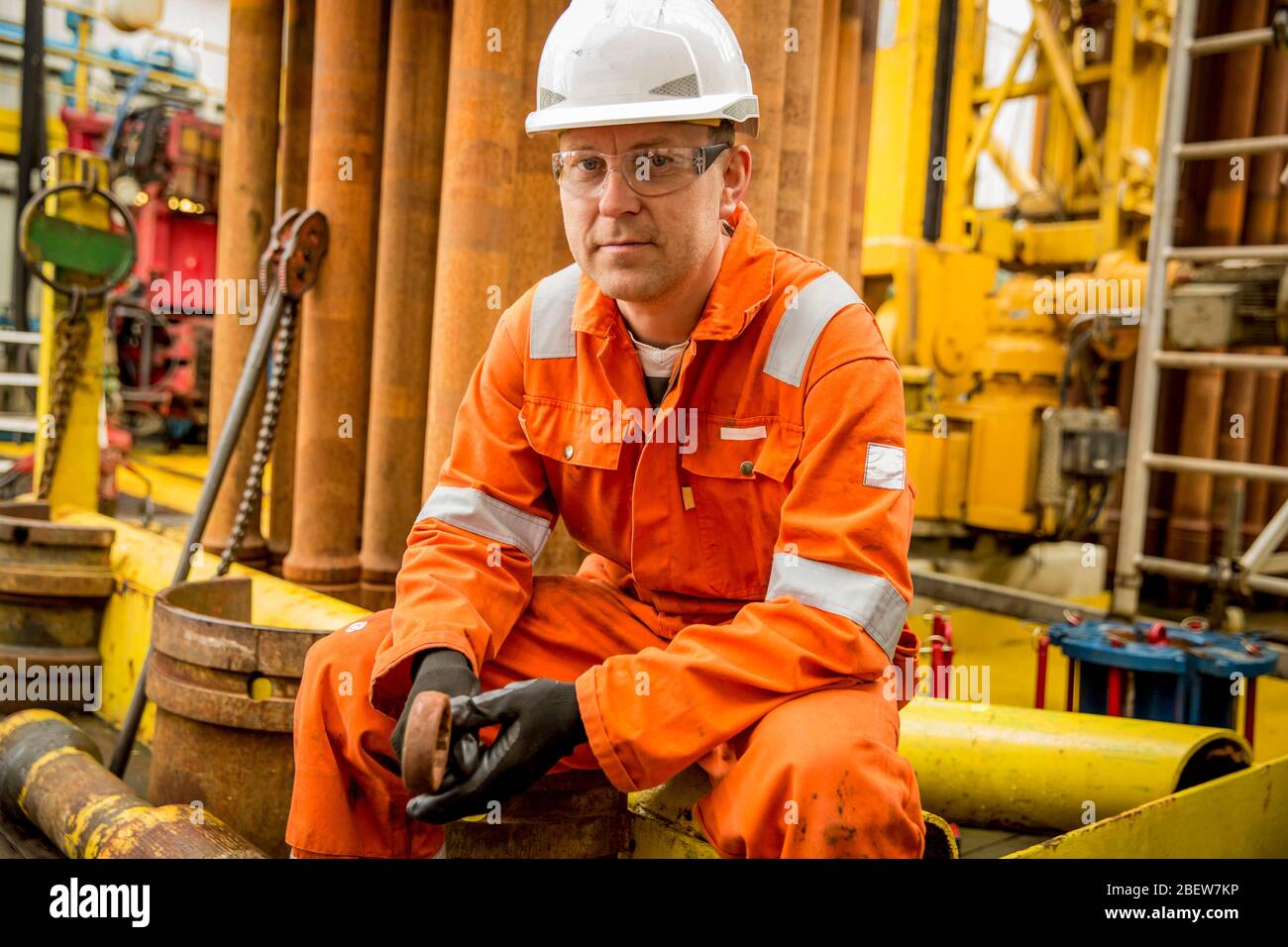 Oil rig worker helmet hi-res stock photography and images - Alamy