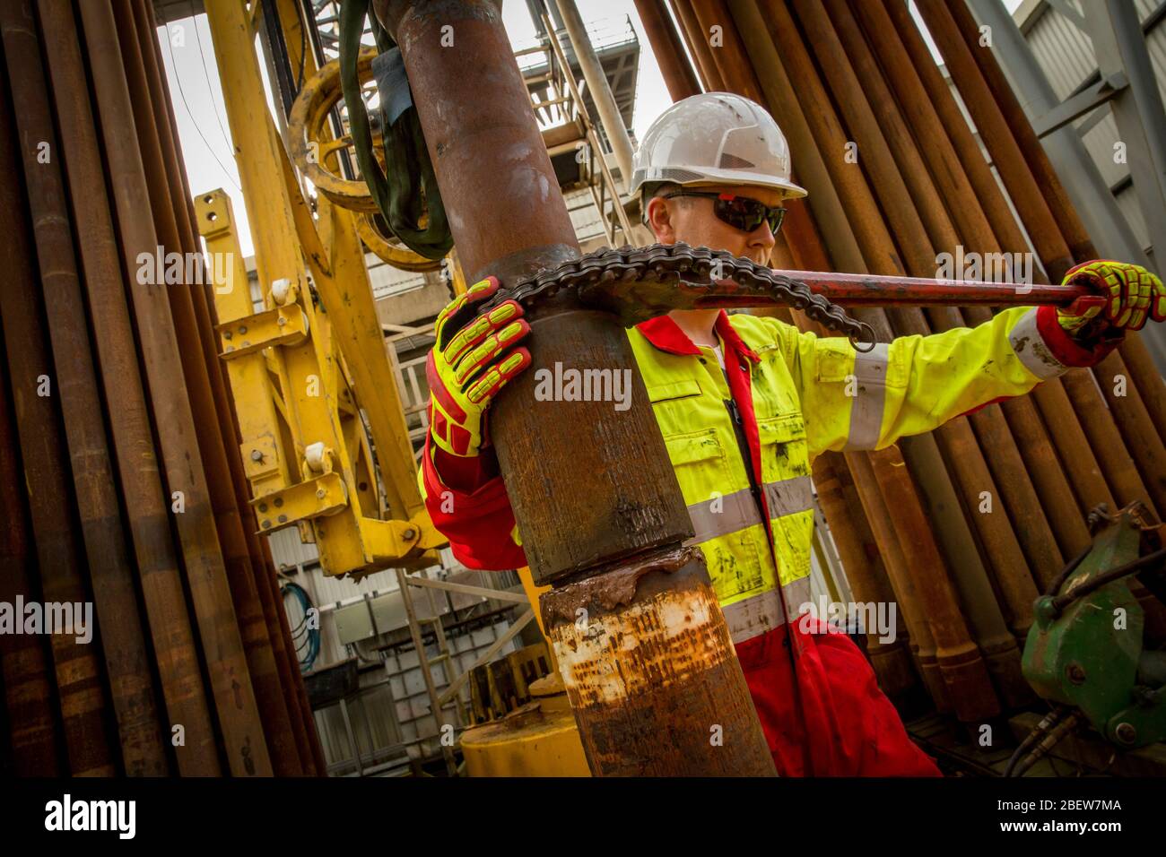 Oil rig worker helmet hi-res stock photography and images - Alamy