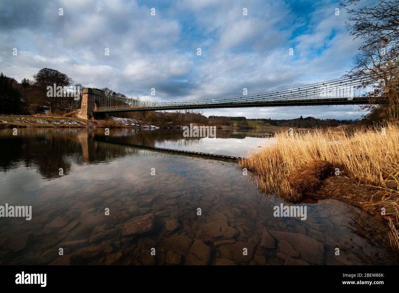 The Union Chain Bridge crossing the River Tweed Stock Photo - Alamy