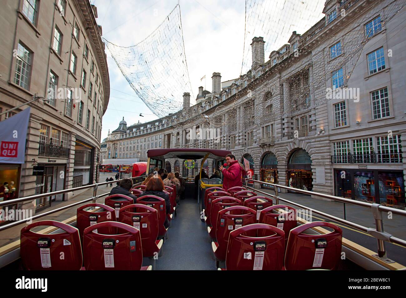 Guided tour through the streets of London atop an open roof red double ...